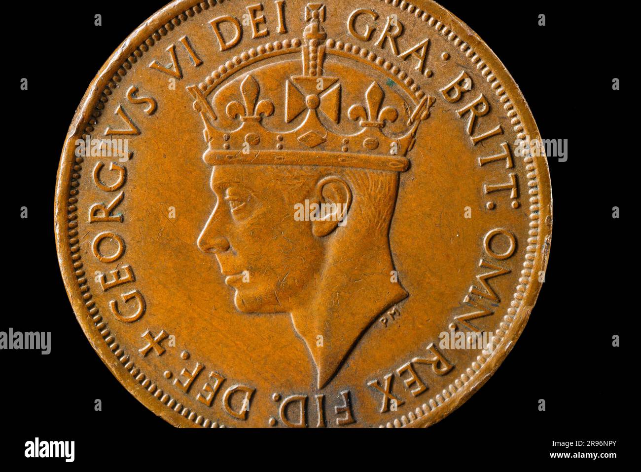 1945 one twelth of a shilling featuring a crowned portrait of George VI ...