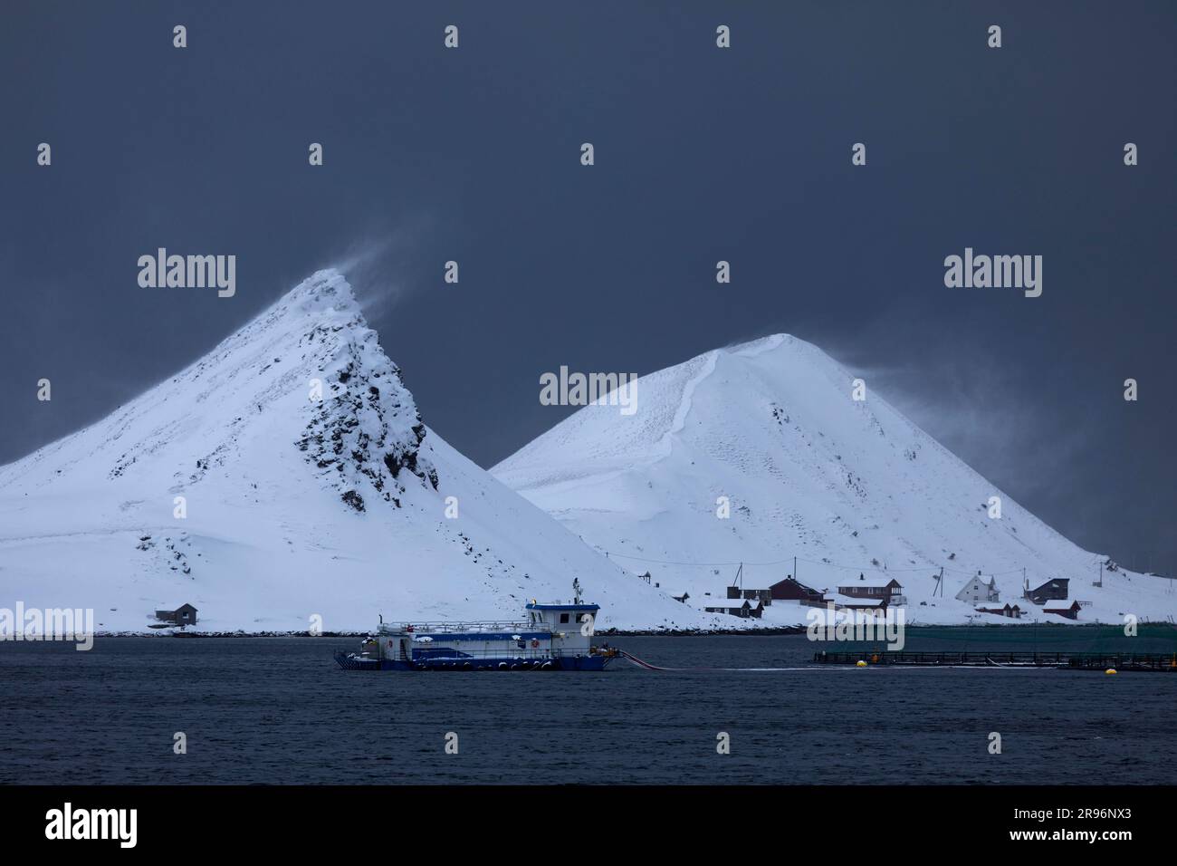 Windswept snow-capped mountains on the island of Mageroya, Honningsvag ...