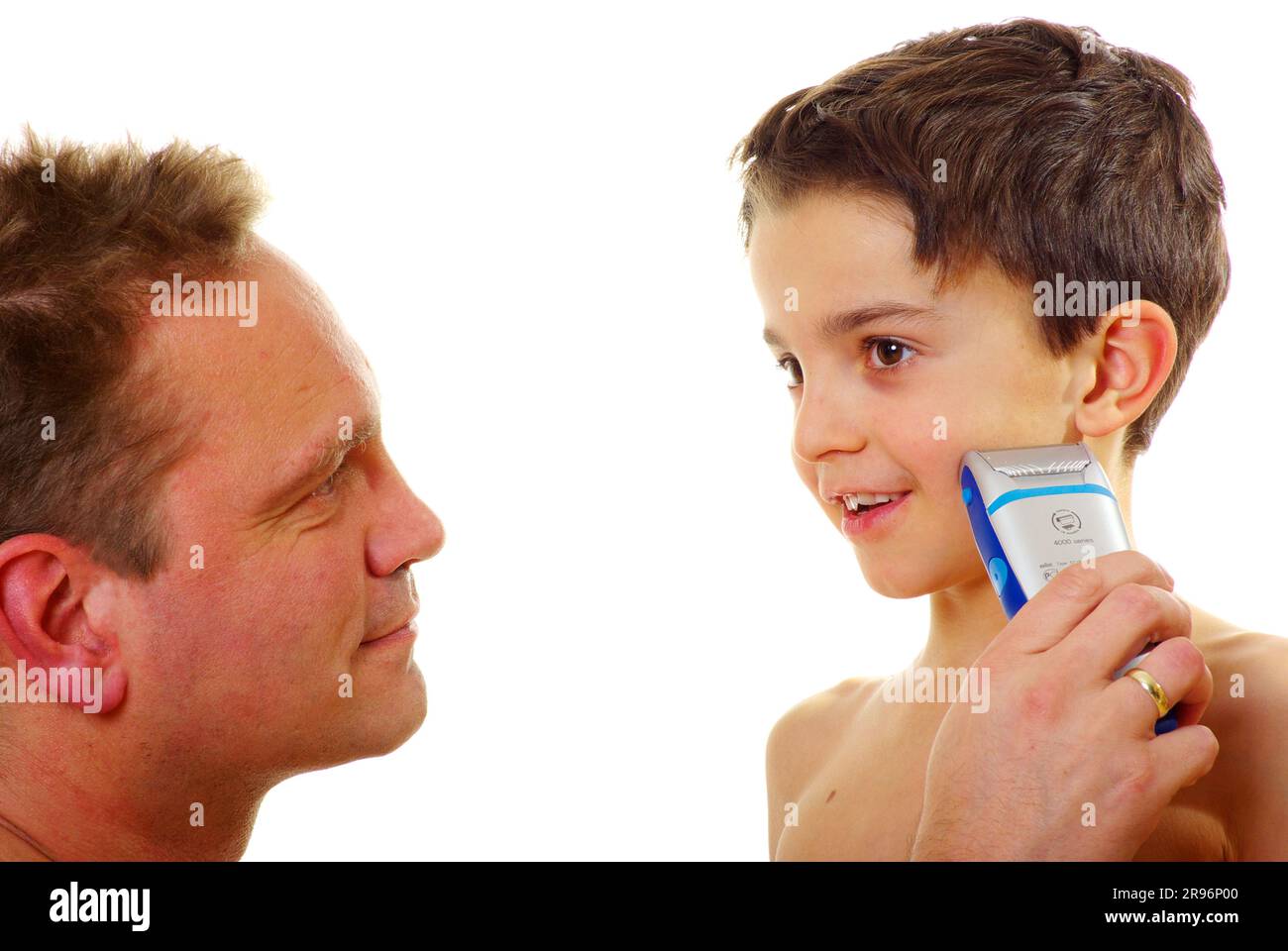 Father and son practice shaving, shaving, razor, dry shaver, sideways ...