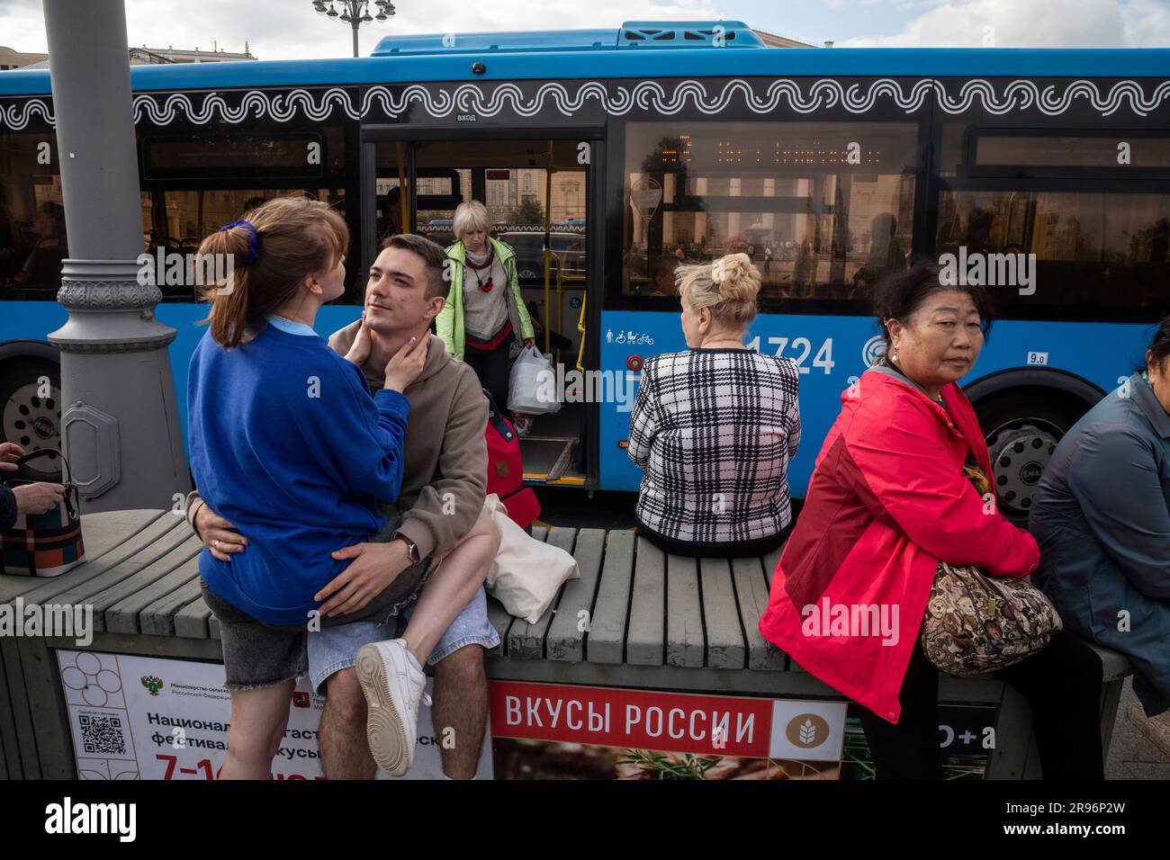 Chinese woman waiting bus stop hi-res stock photography and images - Alamy