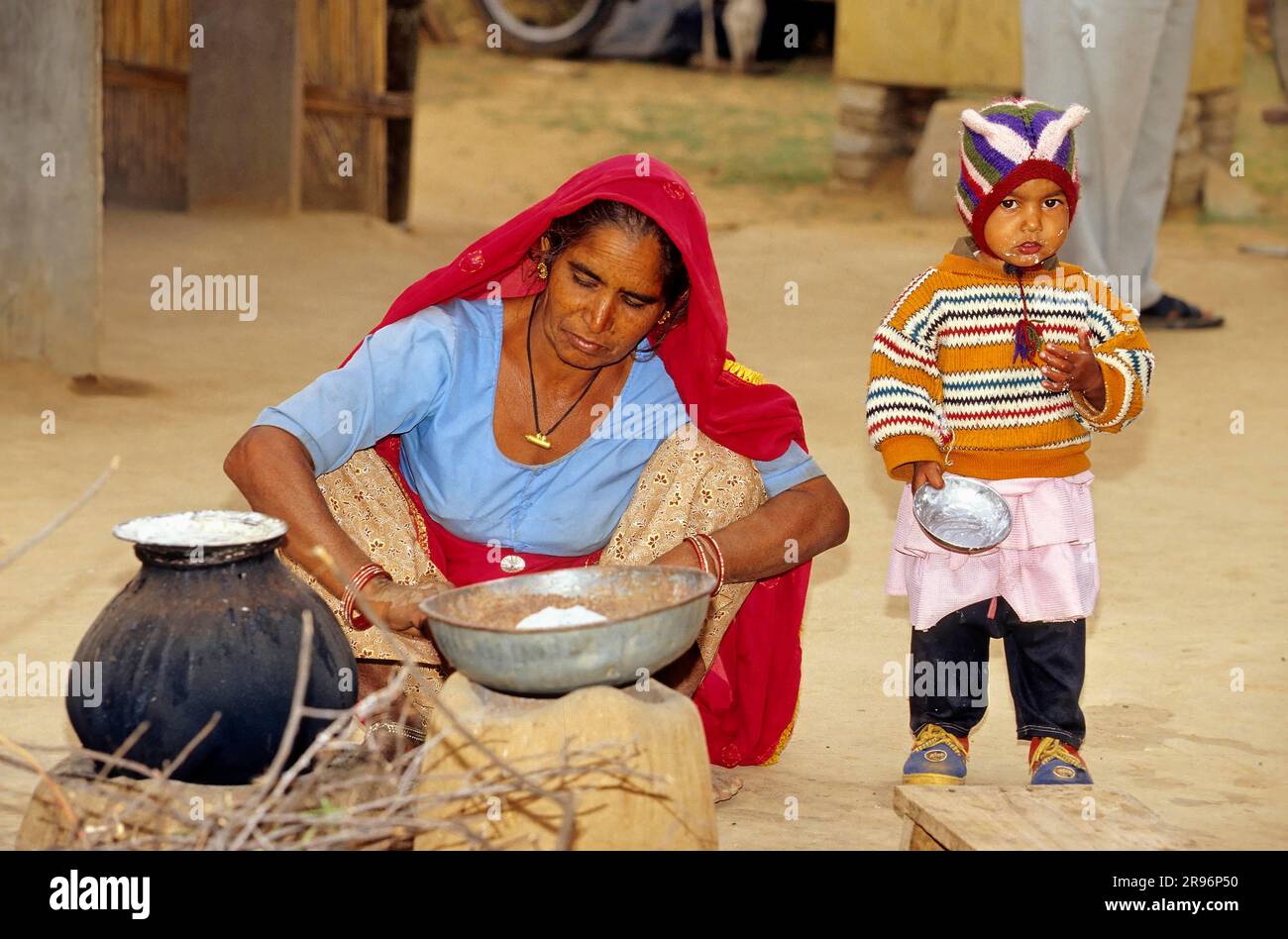Indian woman doing housework, Indian family, Corbett, India Stock Photo ...