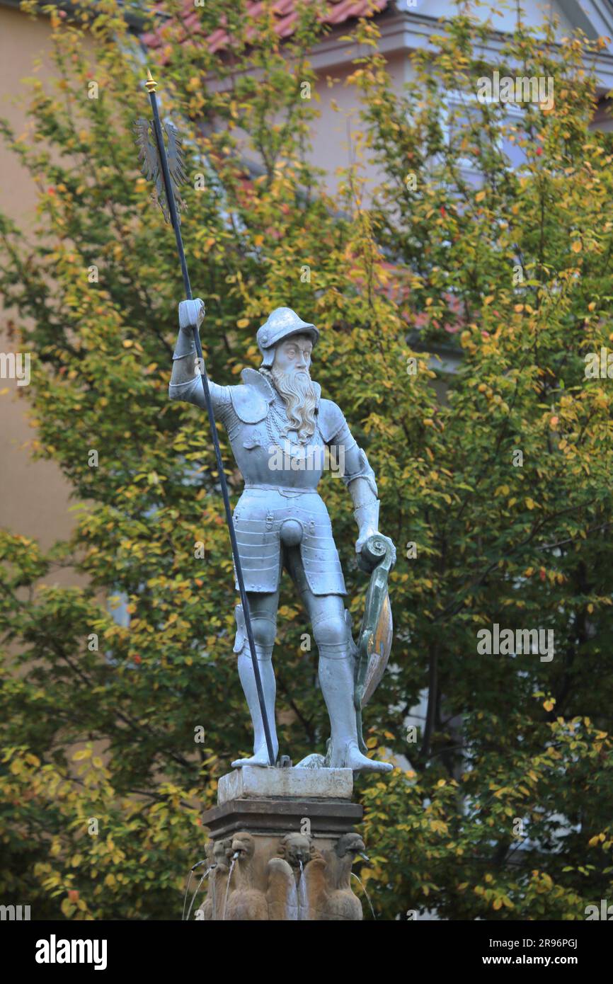 Historic hop fountain built 1573 with knight in armour with lance and ...