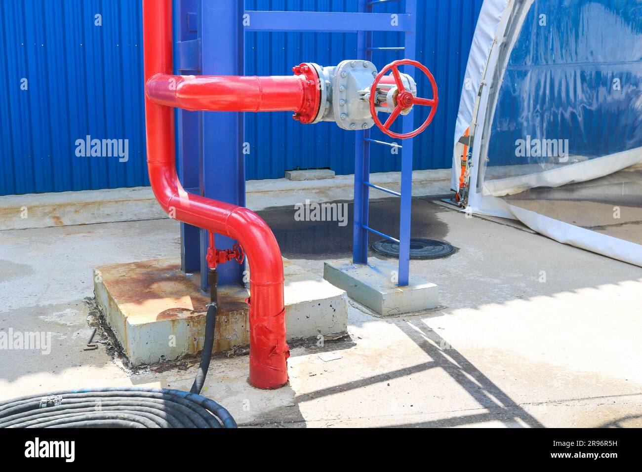 Iron red metal pipe with valve and flanges and drainage for emergency ...
