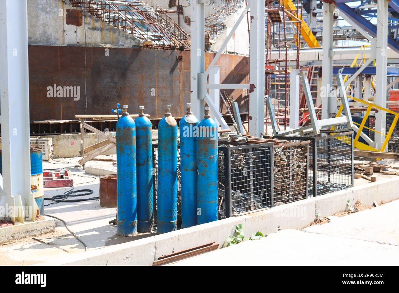 Blue iron metal cylinders with liquefied gas oxygen oxygen air helium ...