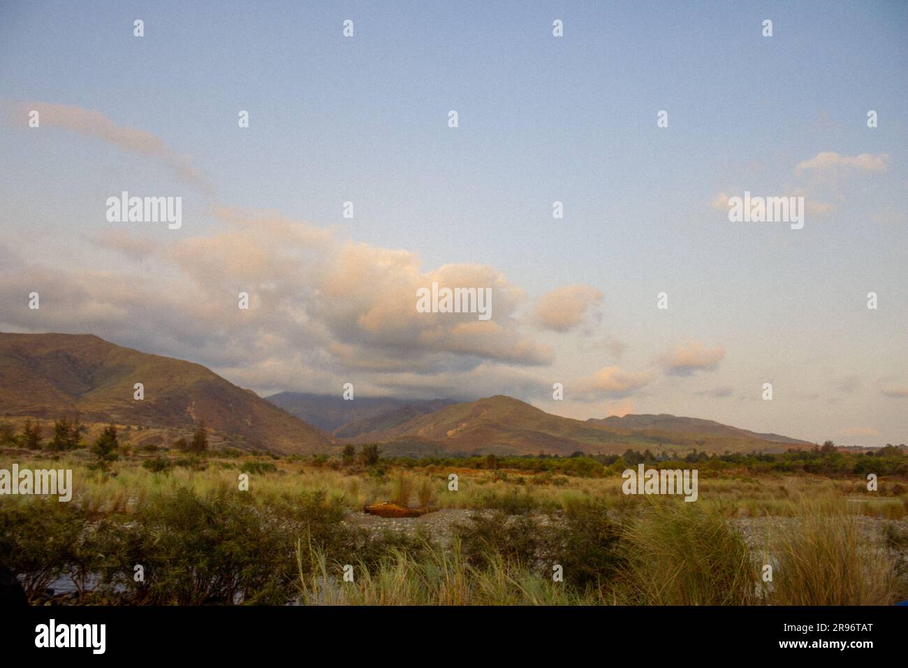 Mountains, river, and grasses in Iba, Philippines Stock Photo - Alamy