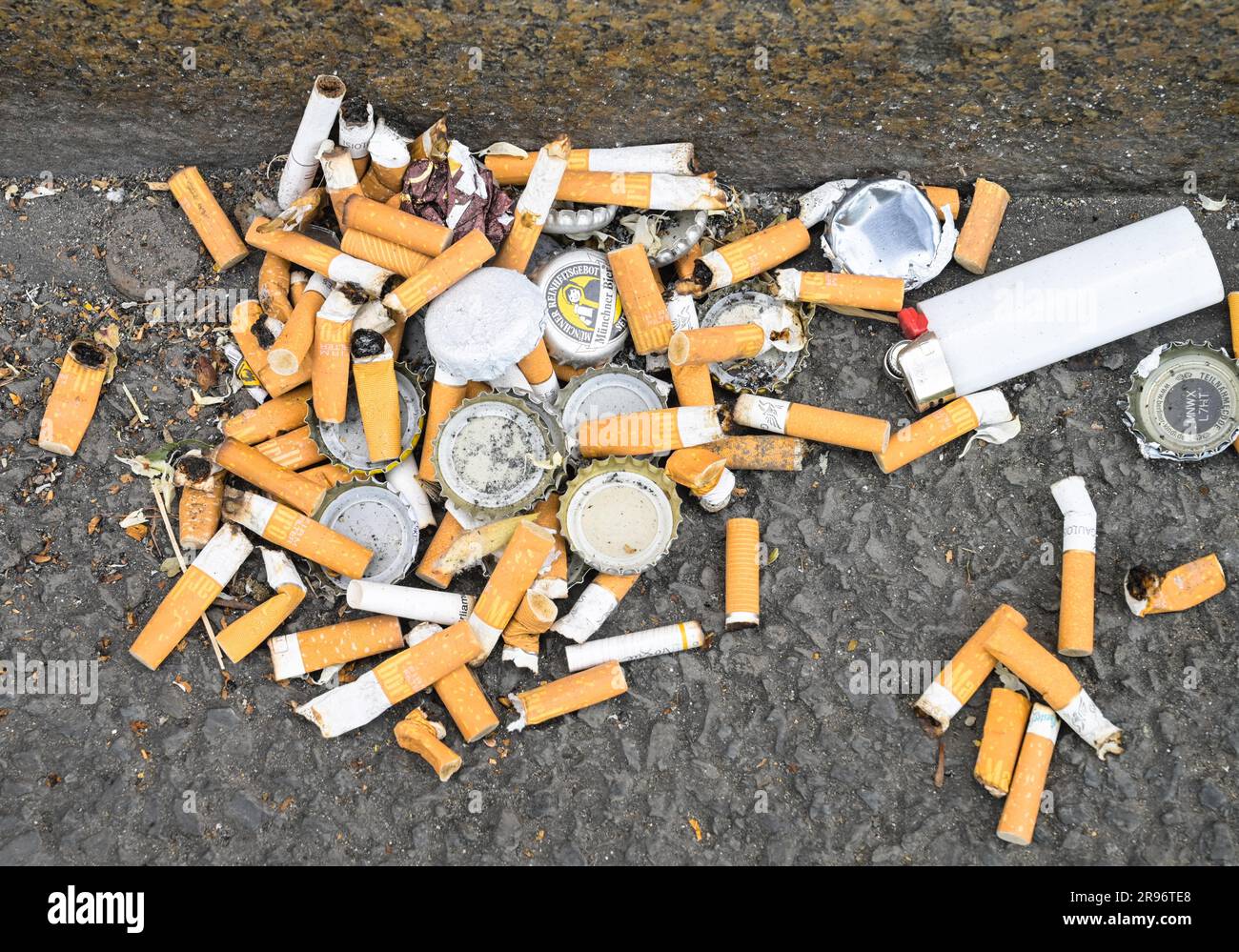 Cigarette butts, pollution Stock Photo - Alamy