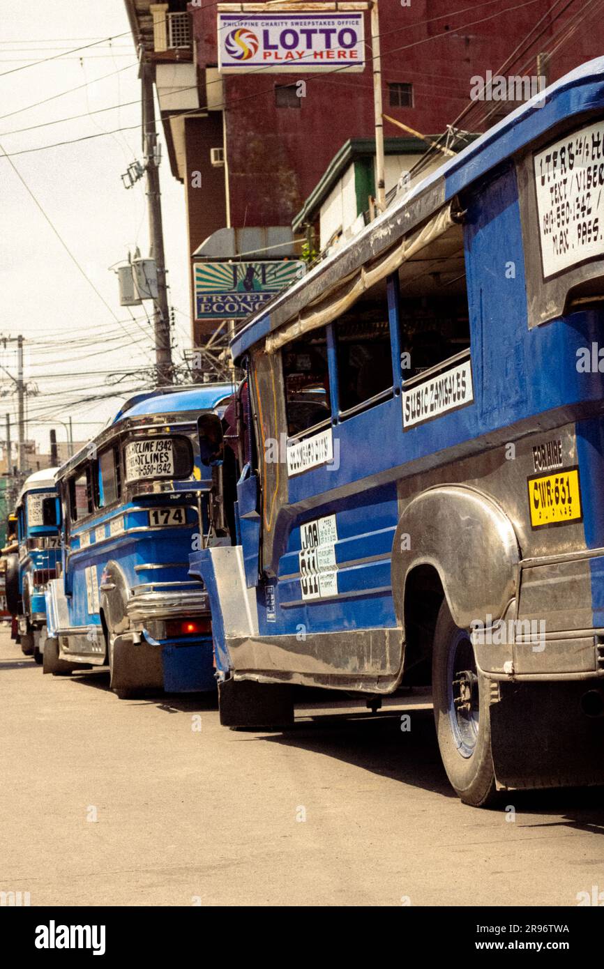 Blue jeepneys lined up on the street in Olongapo, Philippines Stock ...