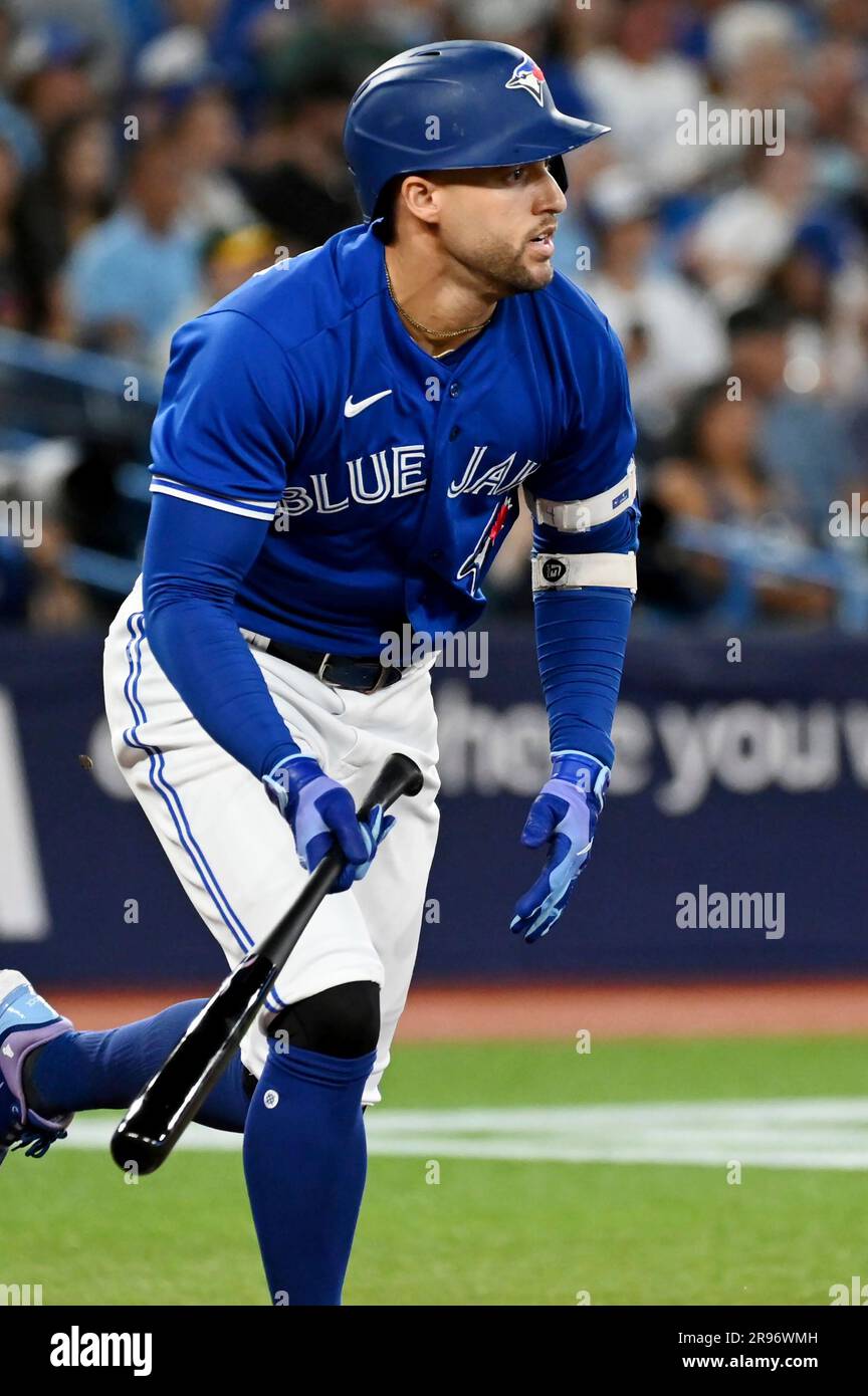 Toronto Blue Jays' George Springer (4) watches his single against the ...