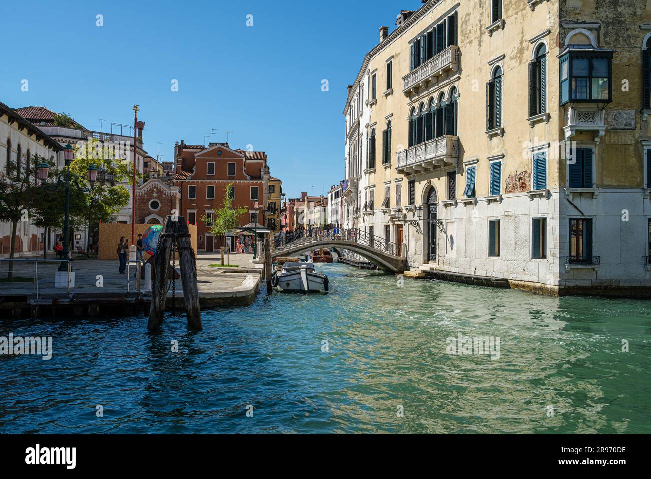 A peaceful river view of the traditional Venetian architecture in Italy ...