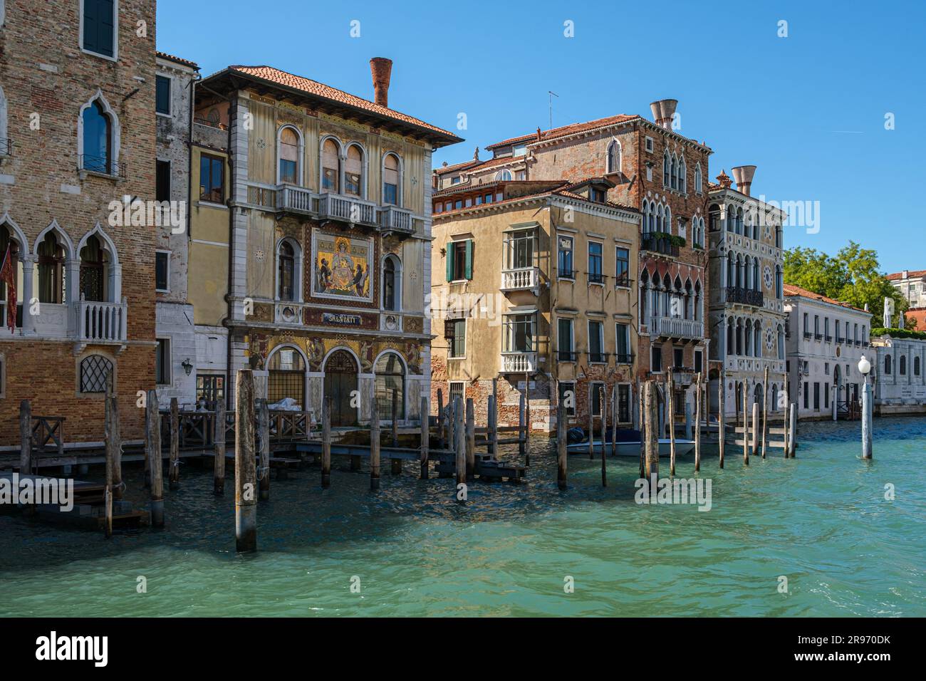 A peaceful river view of the traditional Venetian architecture in Italy ...