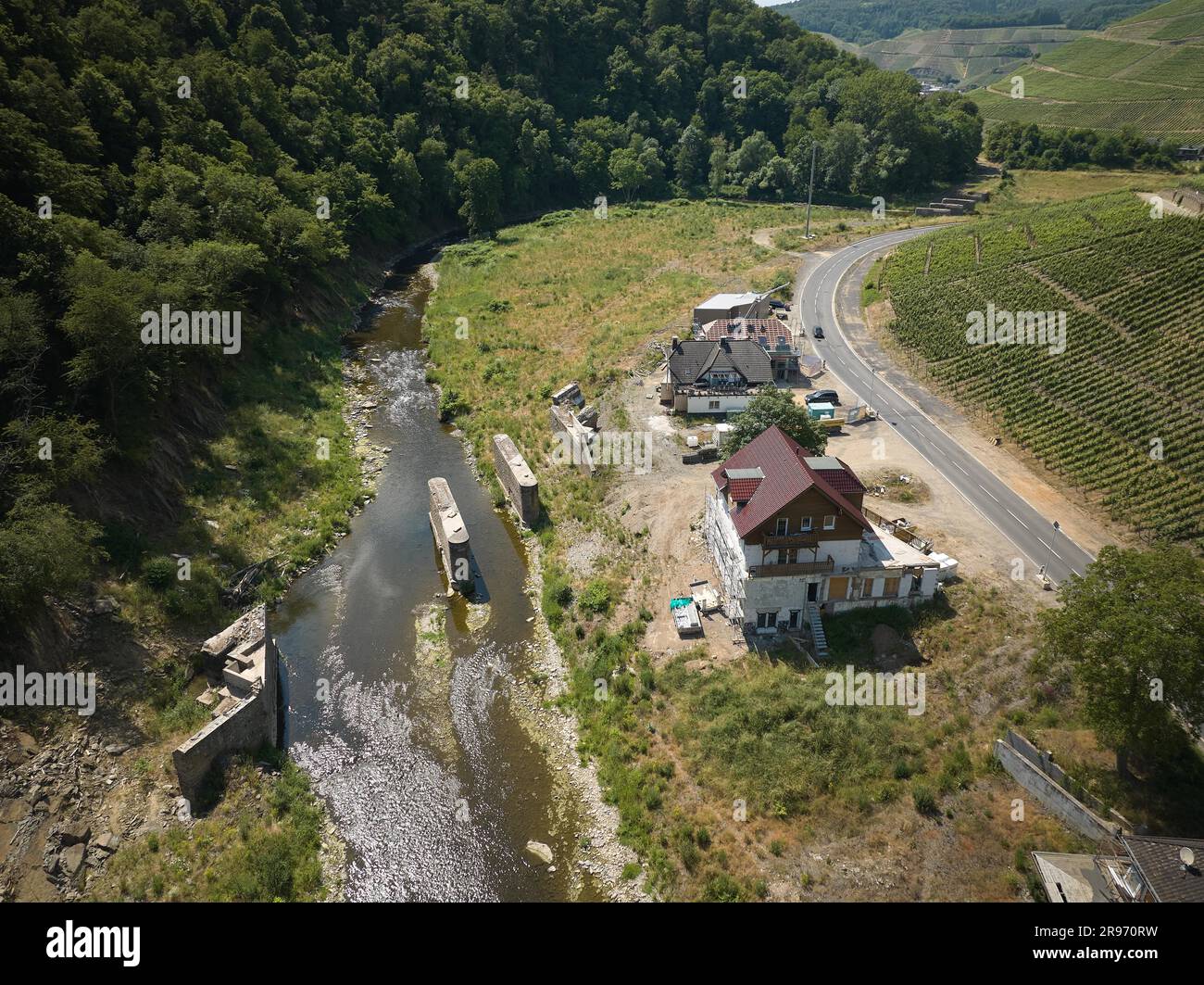 Two years after the flood, the remains of a railway bridge can still be ...