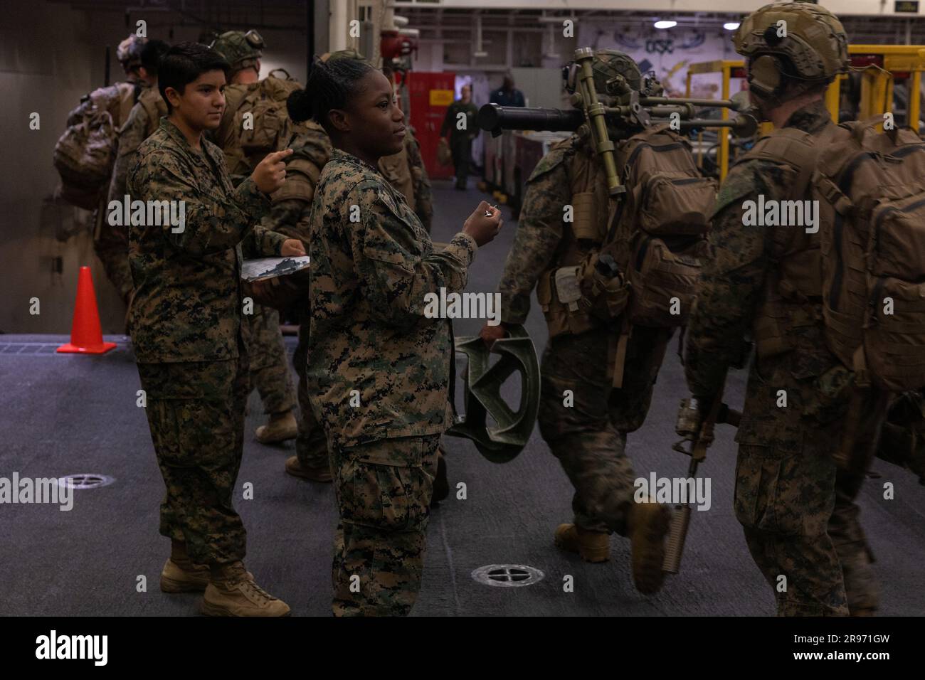 U.S. Marine Corps Cpl. Valeria Chavez Escobar, left, and Cpl. Samantha ...