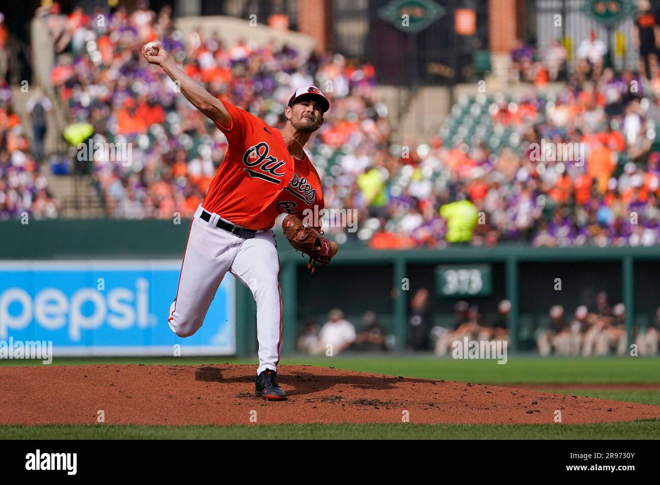 Baltimore Orioles starting pitcher Dean Kremer throws a pitch to the ...