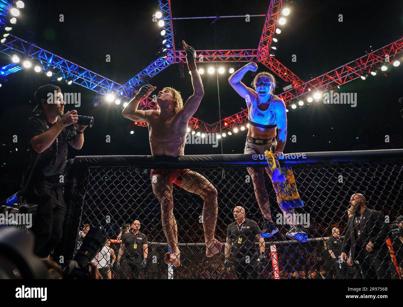 Paddy 'the Baddy' Pimblett of England celebrates his win with Molly ...