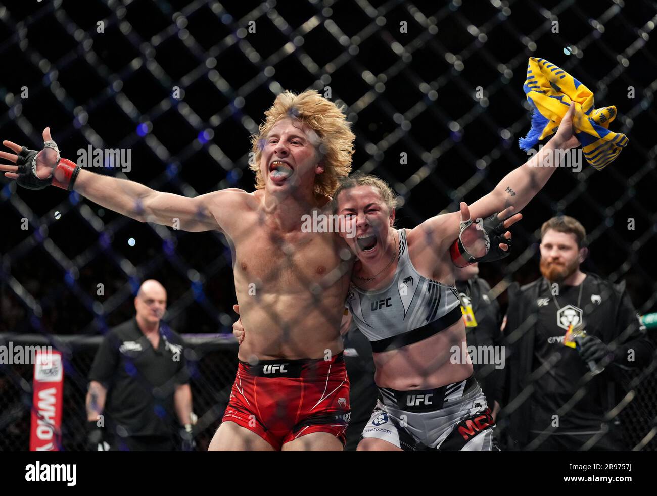Paddy 'the Baddy' Pimblett of England celebrates his win with Molly ...