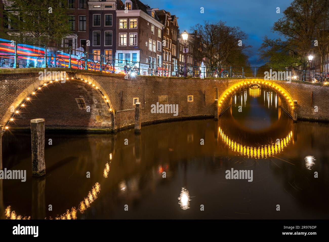 double bridges with lights at night in the Rembrandt-Plein Stock Photo ...