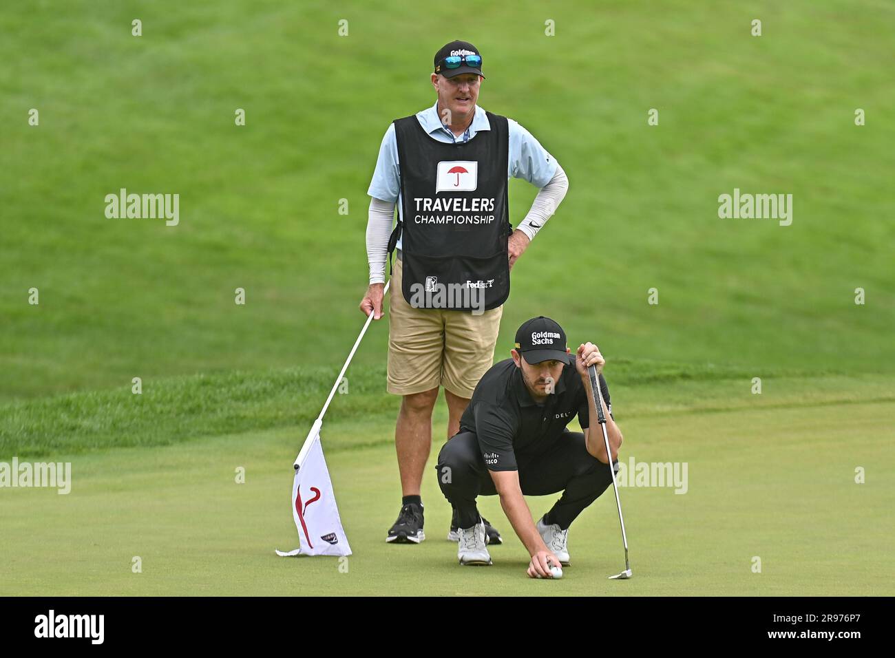 Saturday June 24, 2023: Patrick Cantlay and caddie Joe LaCava look over ...