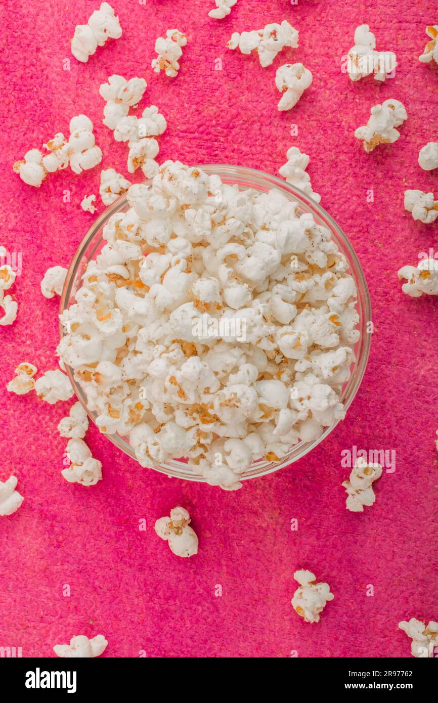 Plate popcorn on yellow hi-res stock photography and images - Alamy