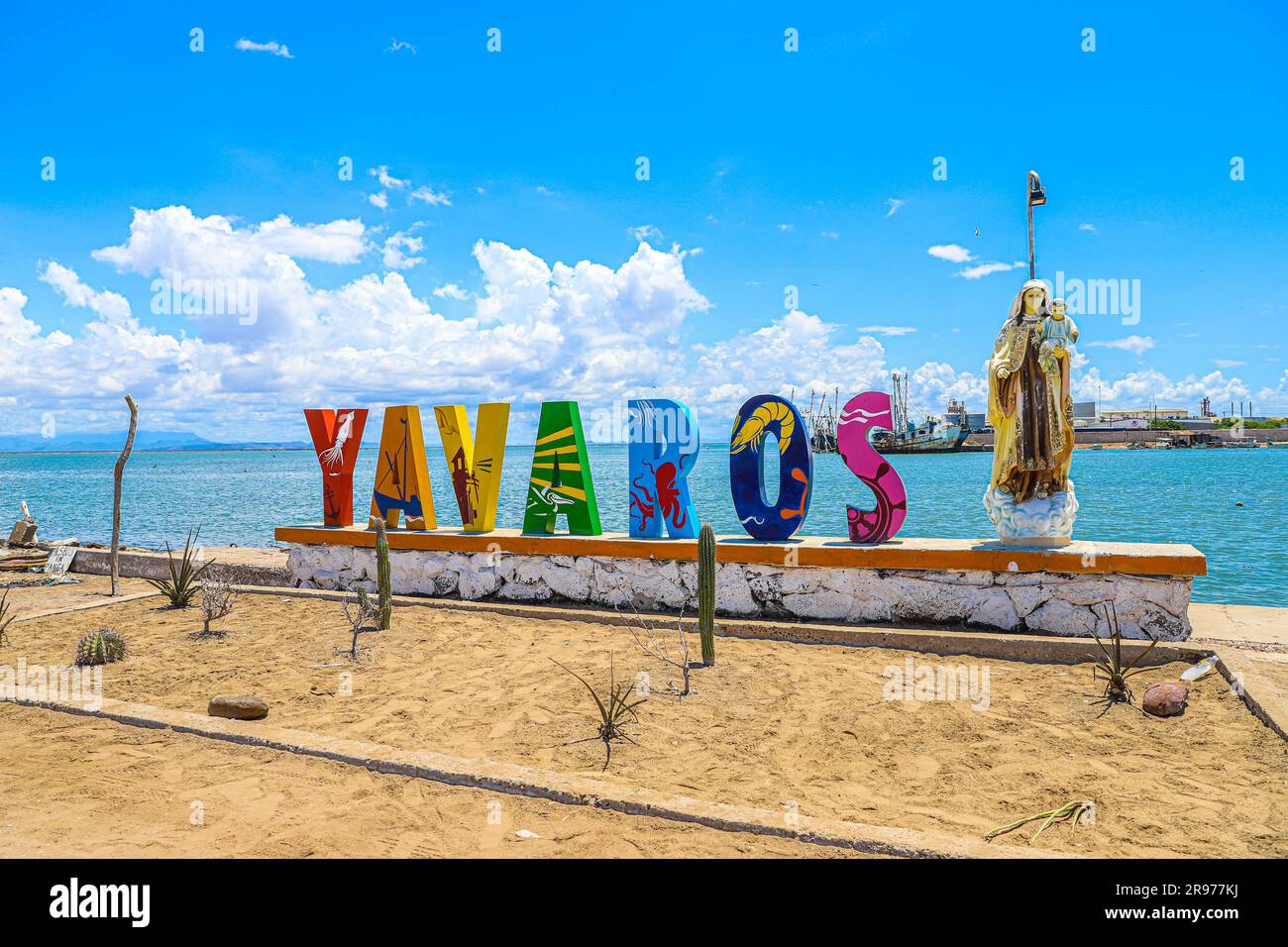 Sacred figure of Santa Muerte and monumental colored letters in the ...