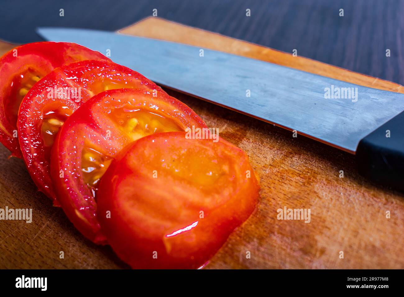 Tomato cut knife hi-res stock photography and images - Alamy