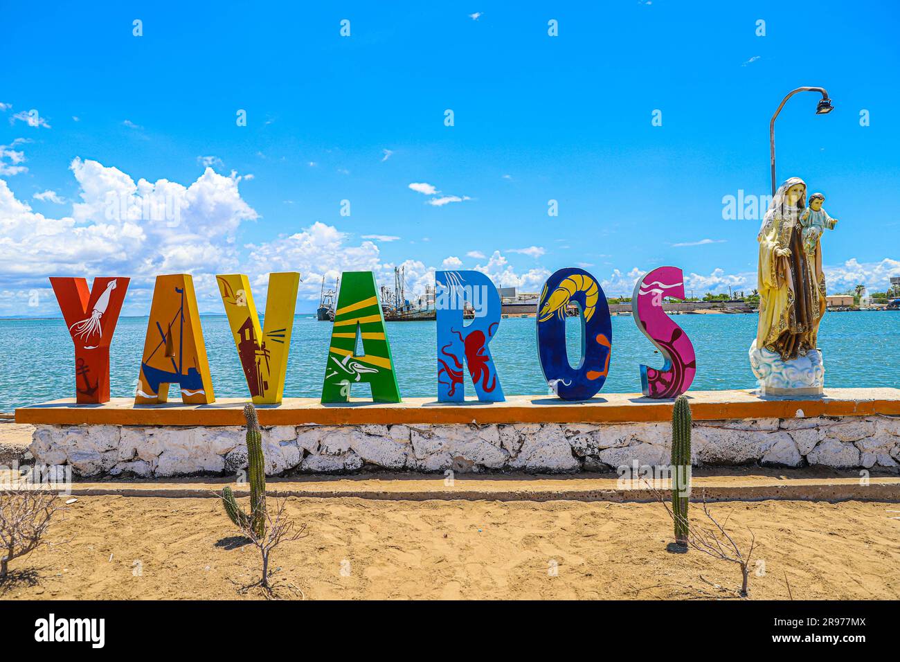 Sacred figure of Santa Muerte and monumental colored letters in the ...