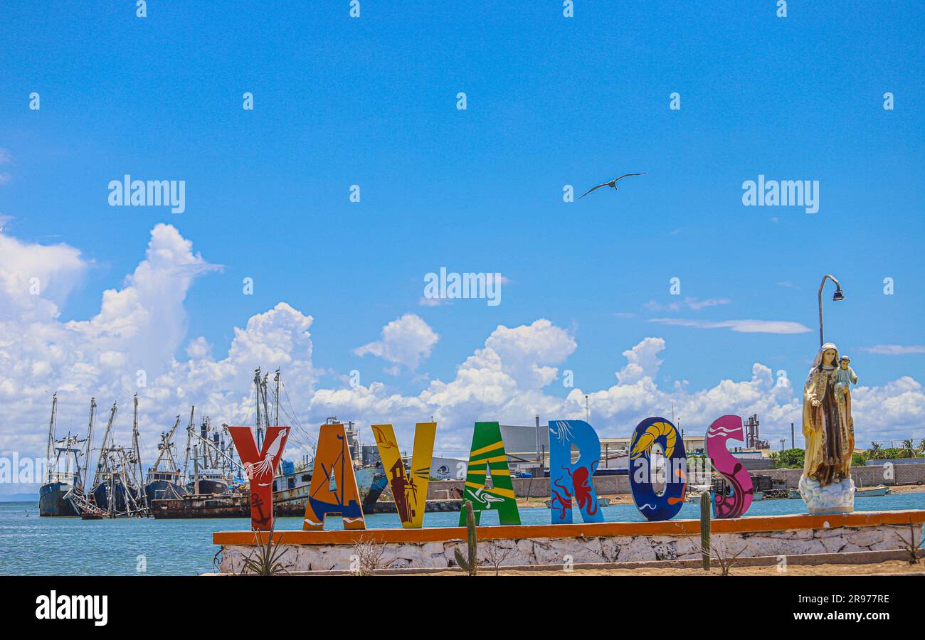 Sacred figure of Santa Muerte and monumental colored letters in the ...