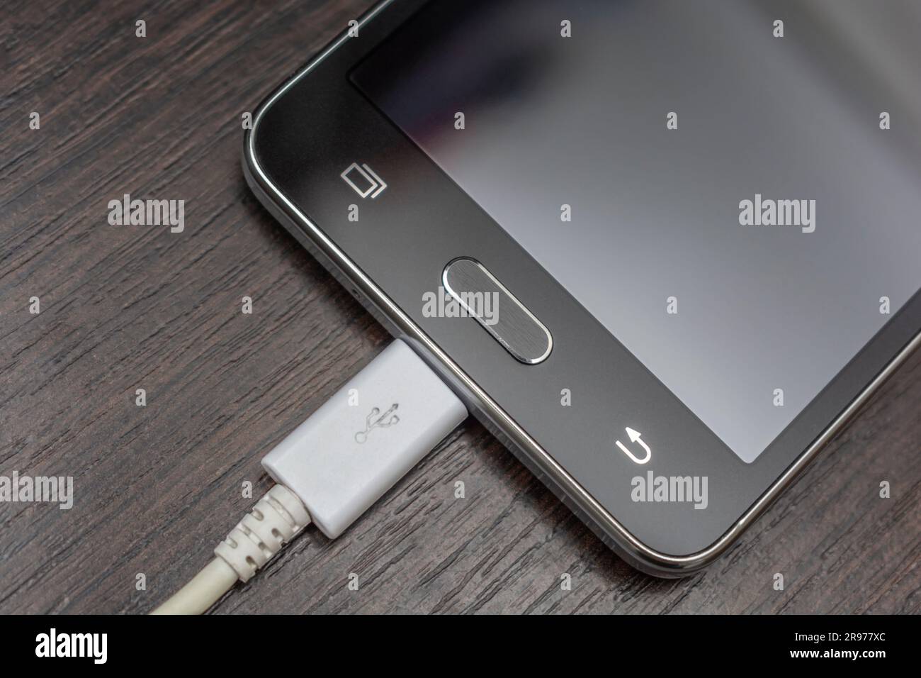 Smartphones charging hi-res stock photography and images - Alamy