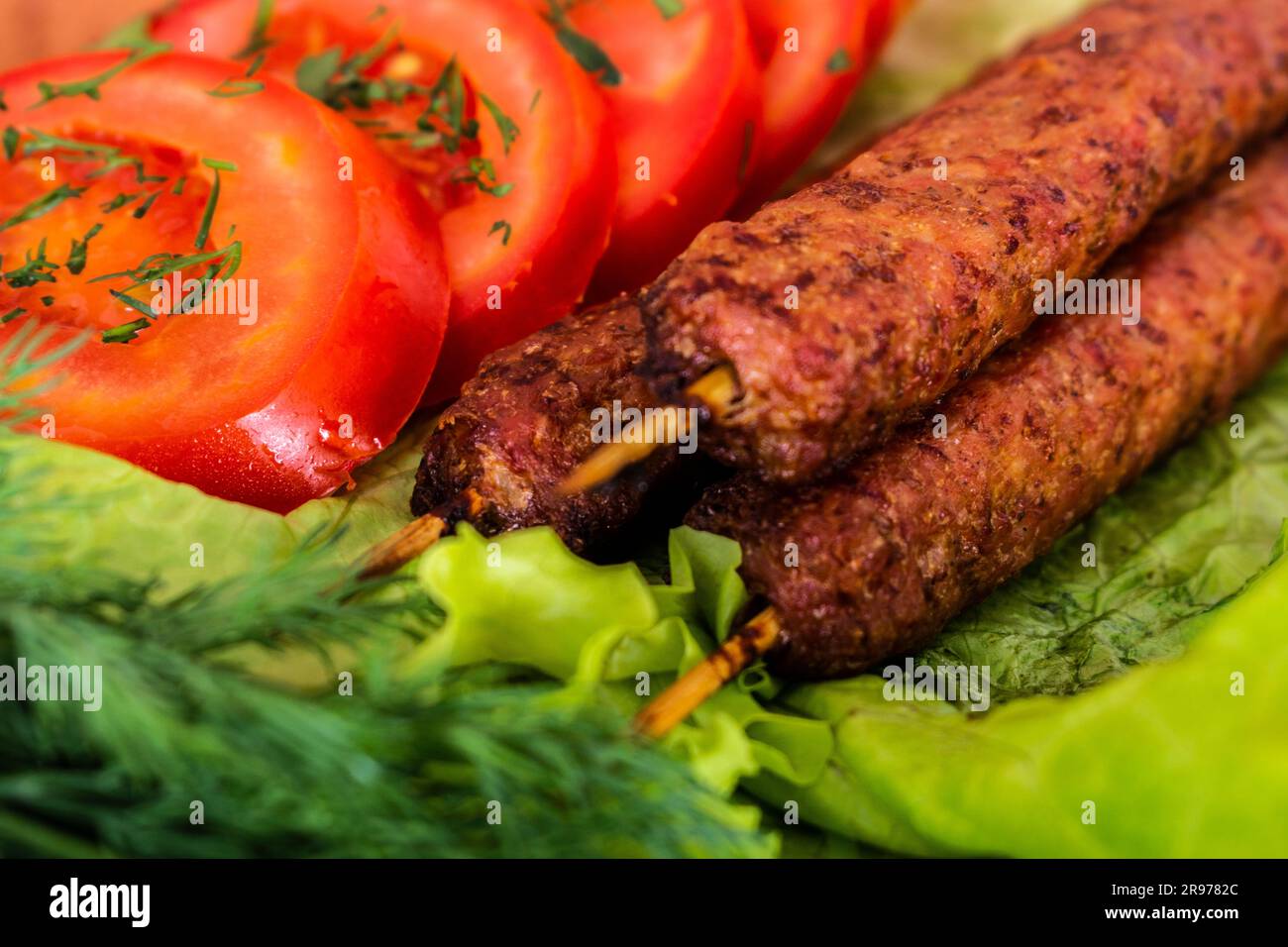 vegetables barbecue salad tomato ketchup lulia kebab with golden crust ...