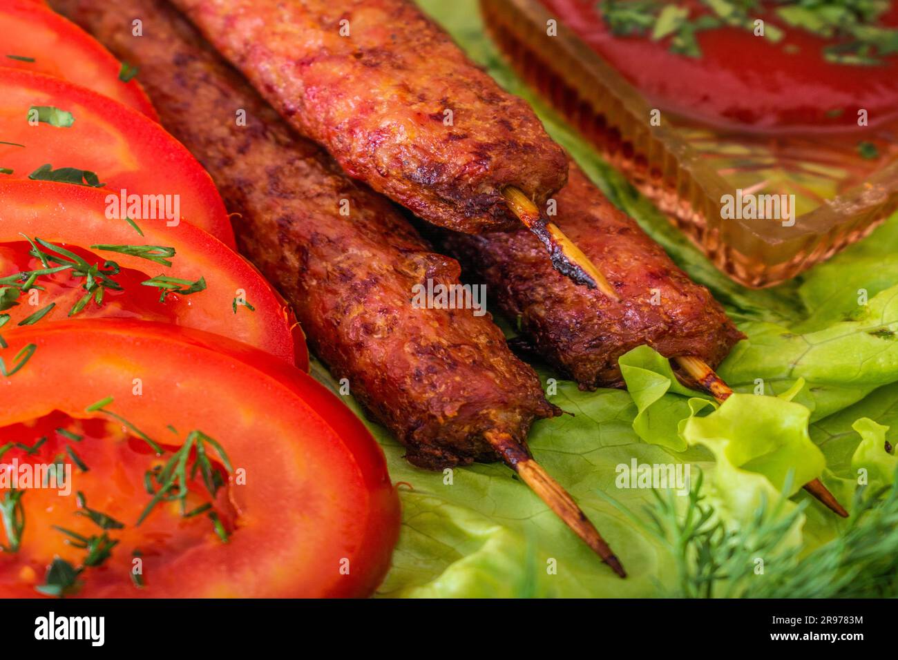 vegetables barbecue salad tomato ketchup lulia kebab with golden crust ...