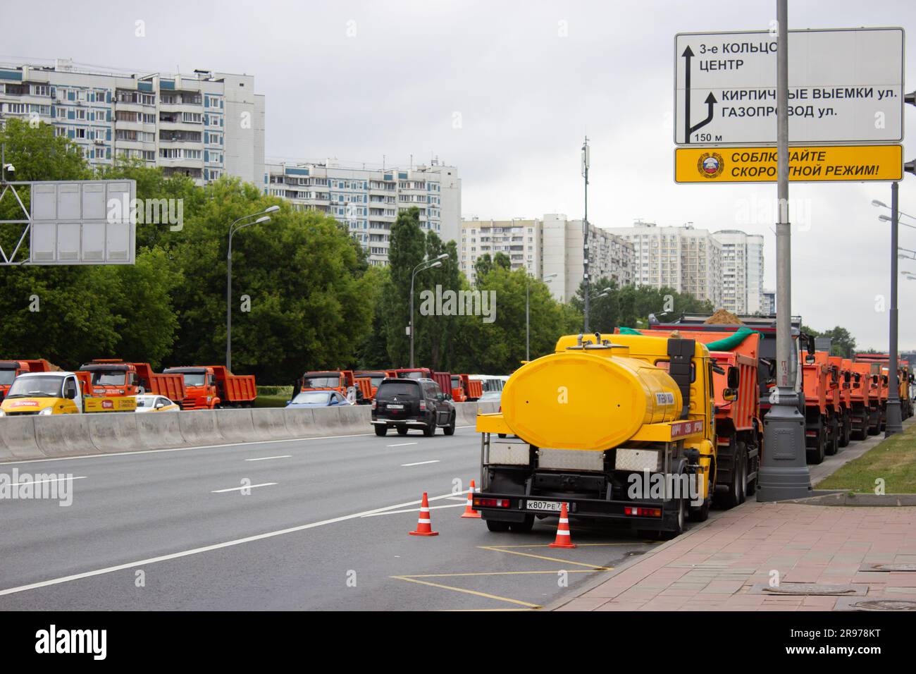 A lot of heavy trucks line up on one of the main highways leading south ...