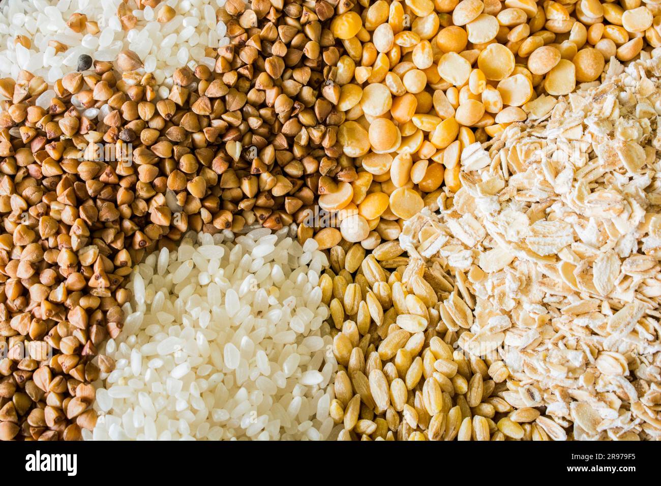 raw buckwheat, peas and rice background texture Stock Photo - Alamy
