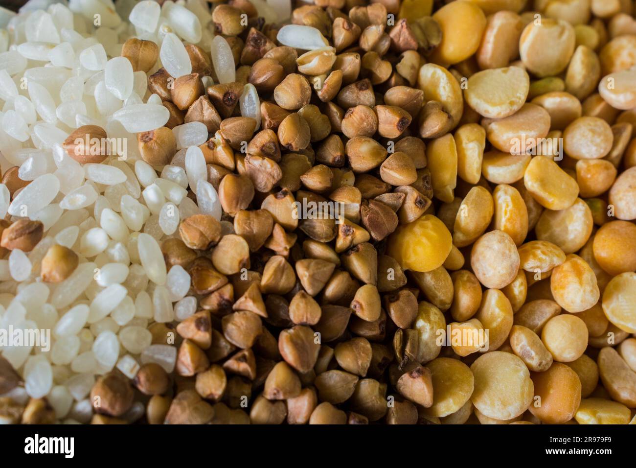 raw buckwheat, peas and rice background texture Stock Photo - Alamy