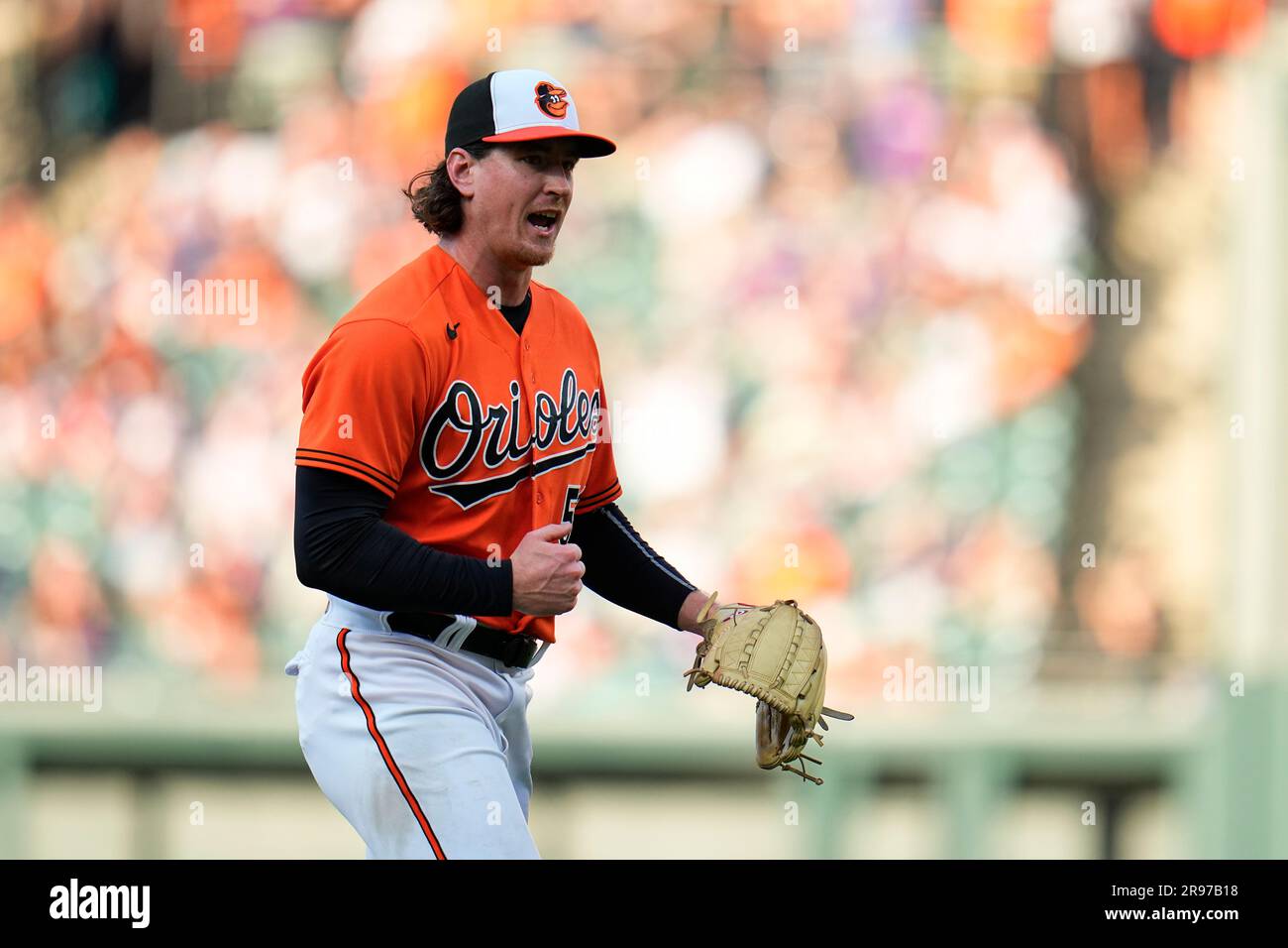 Baltimore Orioles relief pitcher Mike Baumann reacts after retiring the ...