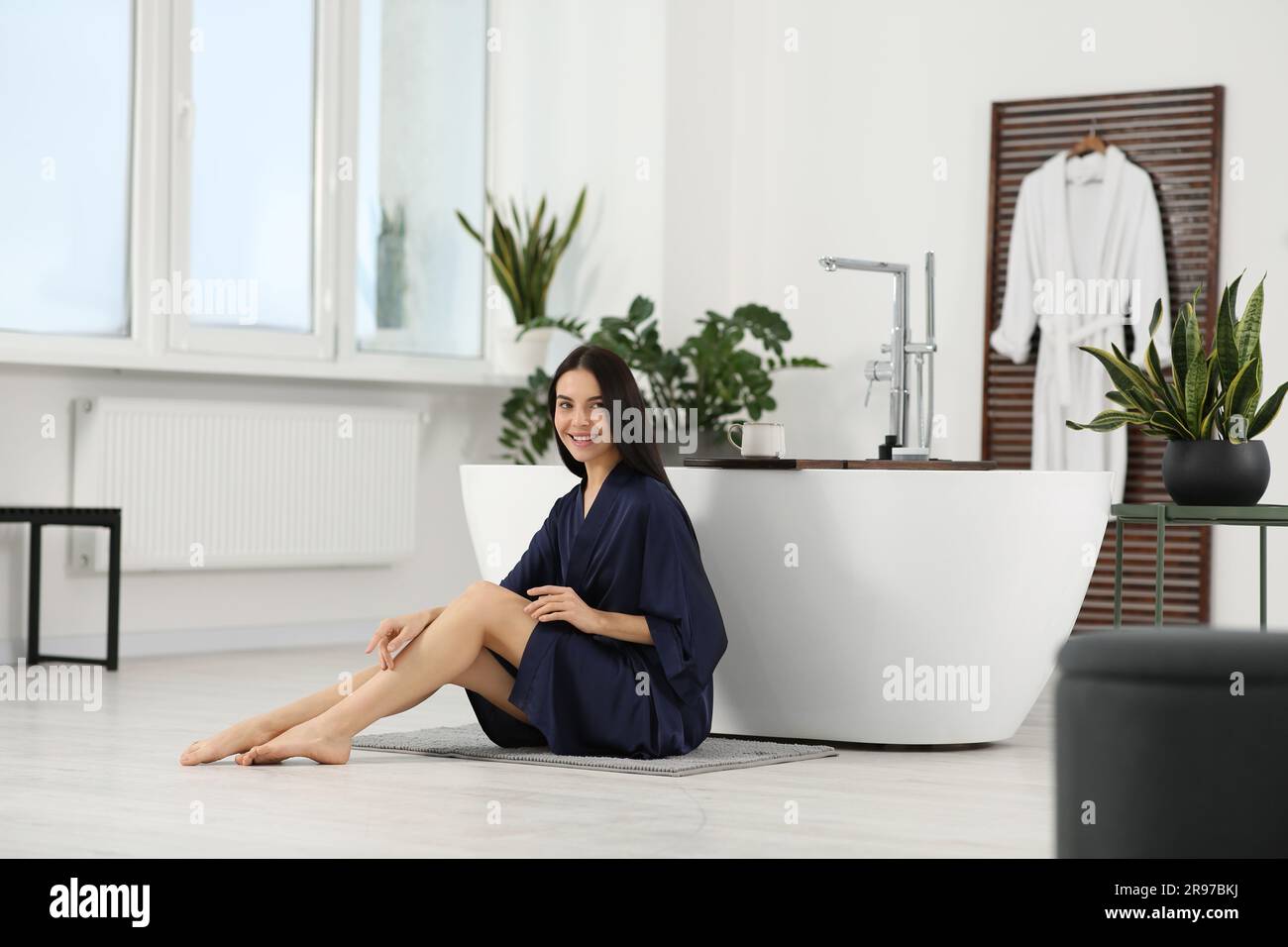 Wearing clothes in the bathtub hi-res stock photography and images - Alamy