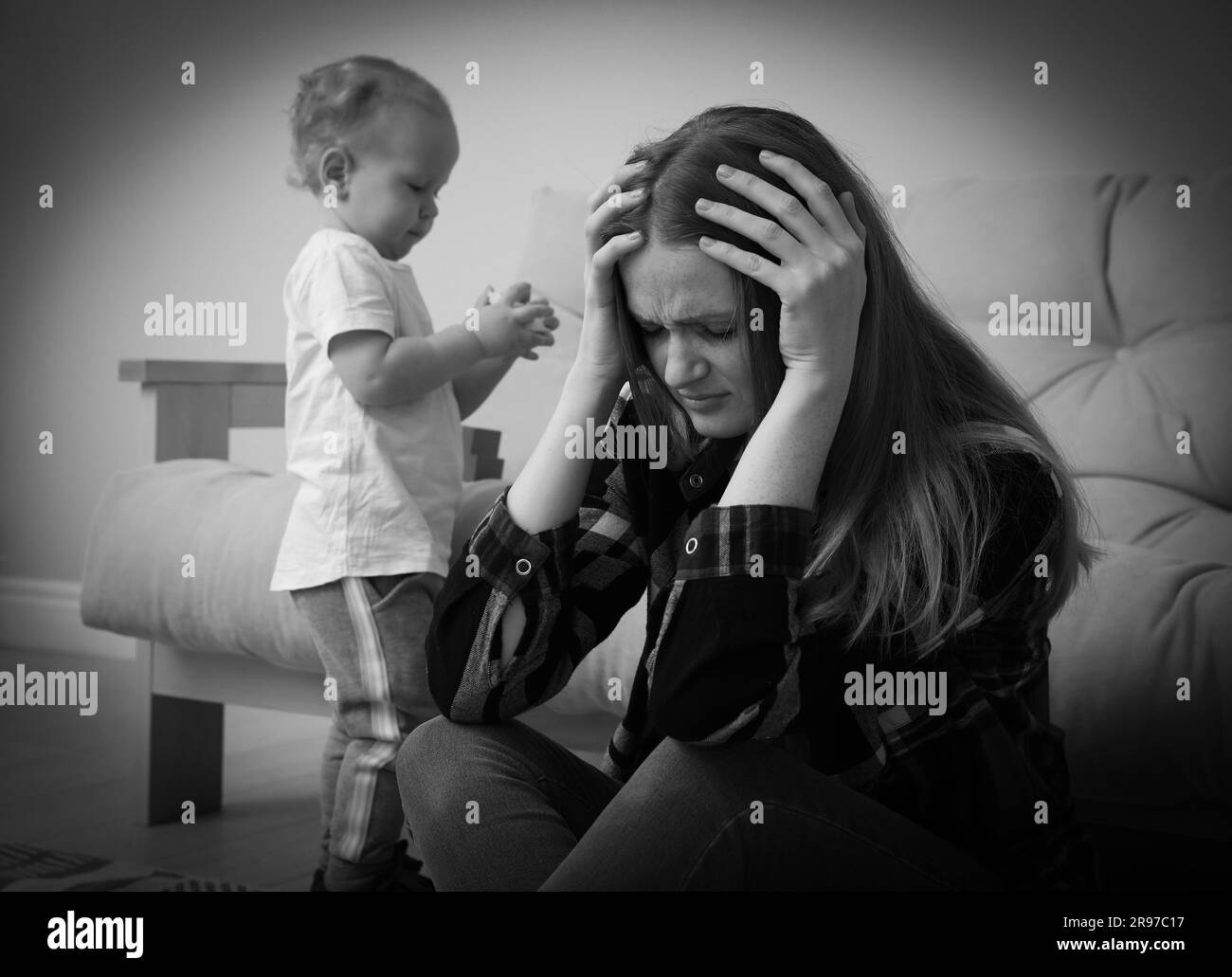 Baby sad mother Black and White Stock Photos & Images - Alamy