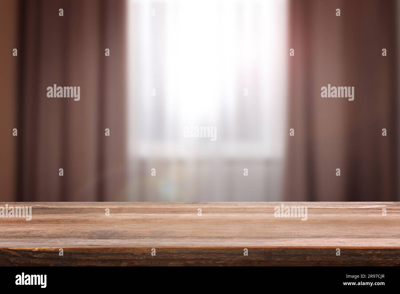Empty wooden table against window with curtains. Space for design Stock ...