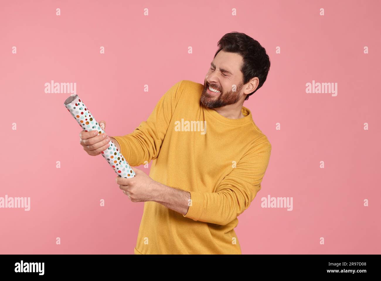 Emotional man party popper hi-res stock photography and images - Alamy