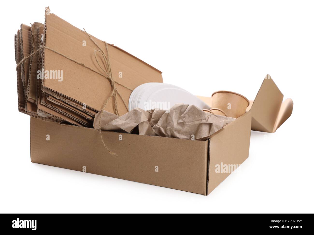 Cardboard box with waste paper isolated on white Stock Photo - Alamy