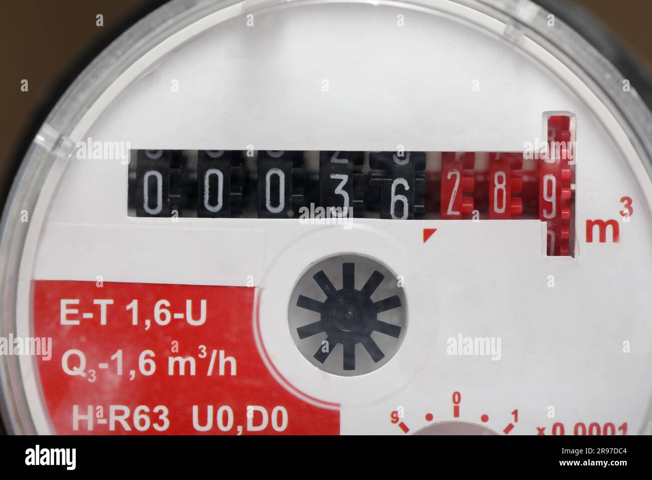 Electric meter on blurred background, closeup view. Water measuring ...
