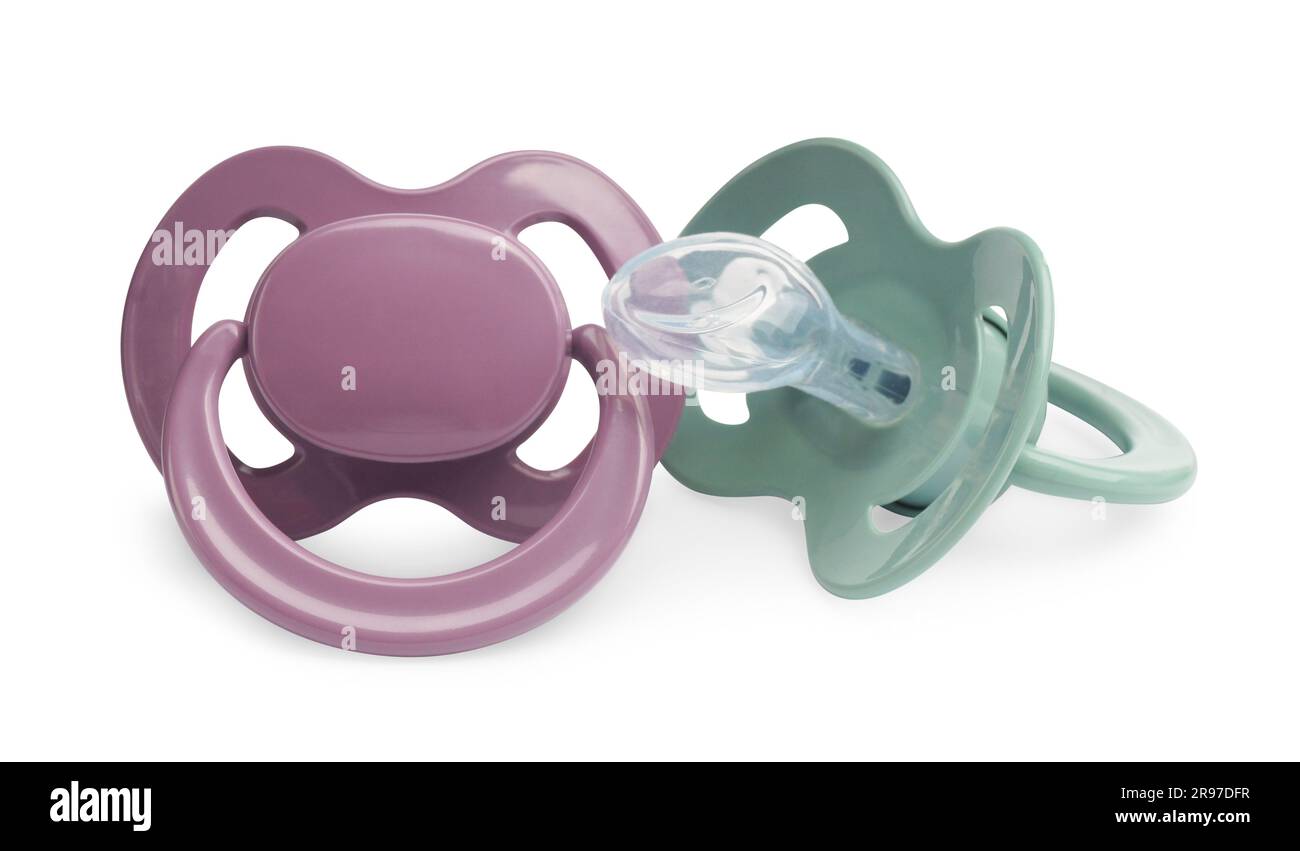 New different baby pacifiers on white background Stock Photo - Alamy
