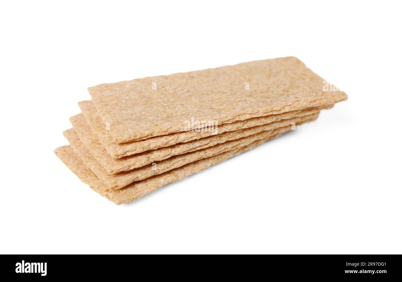 Stack of fresh crunchy rye crispbreads on white background Stock Photo ...