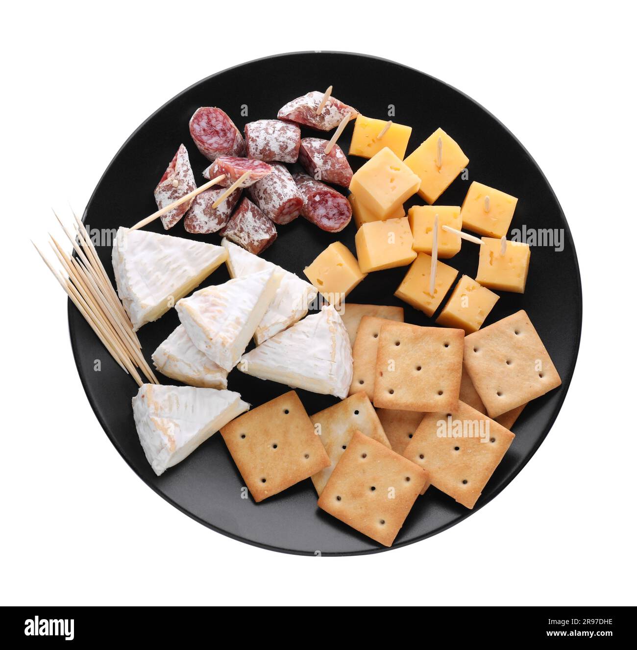 Toothpick appetizers. Tasty cheese, sausage, and crackers on white ...