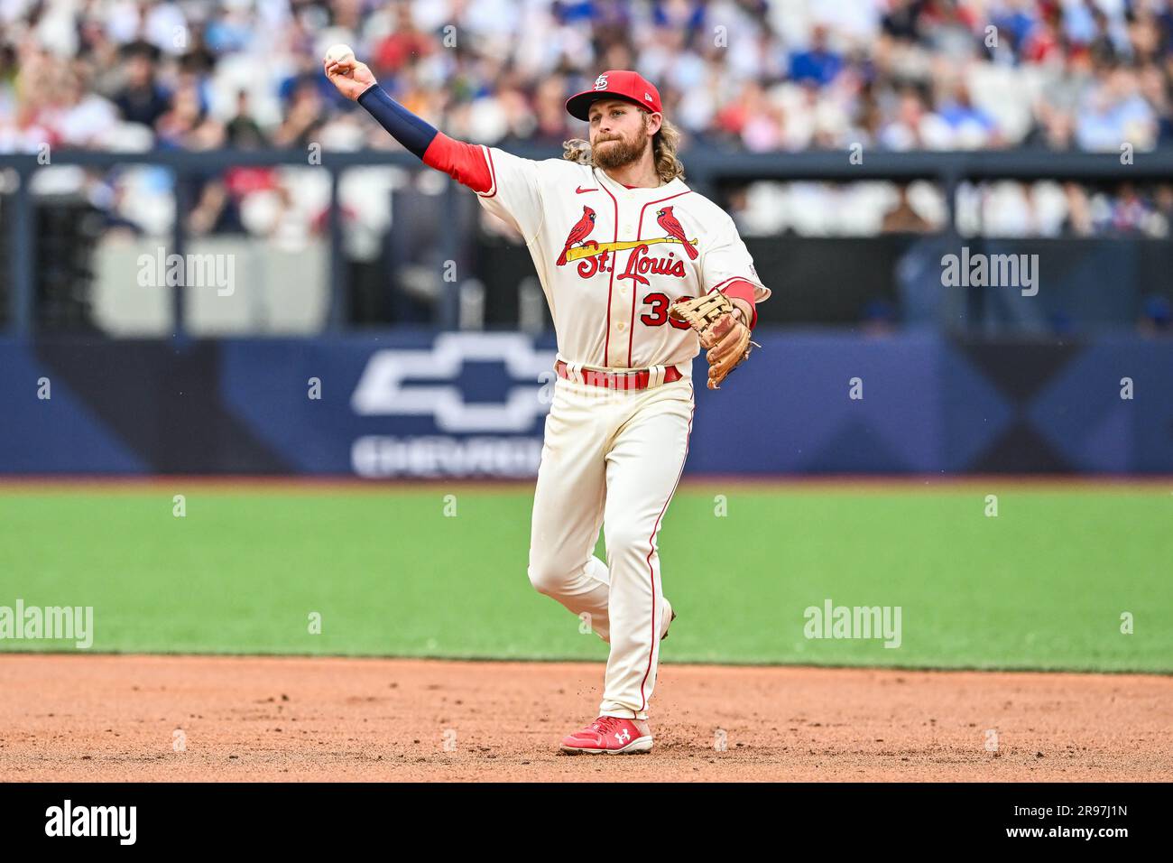 Brendan Donovan #33 of the St. Louis Cardinals throws to first base ...