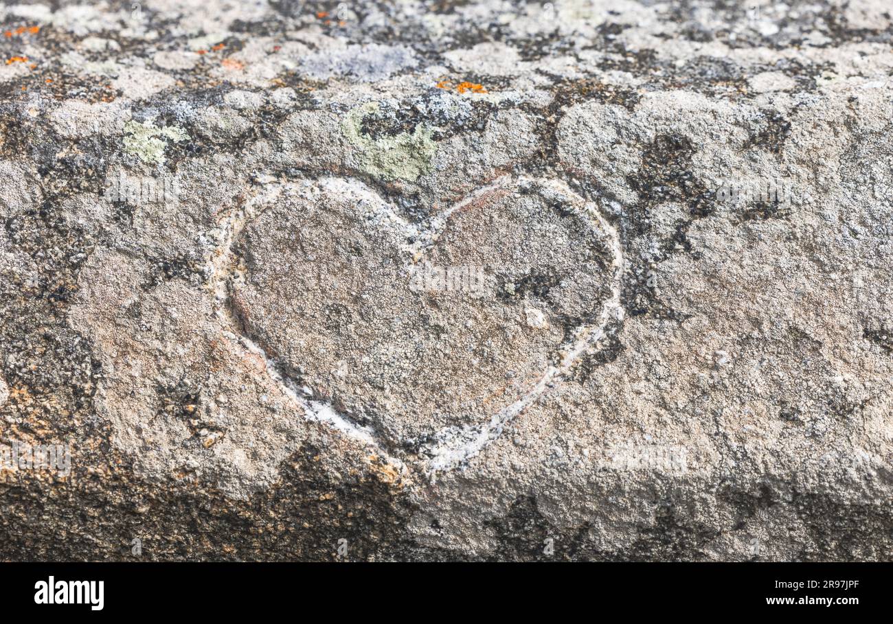 Heart carved into a stone hi-res stock photography and images - Alamy