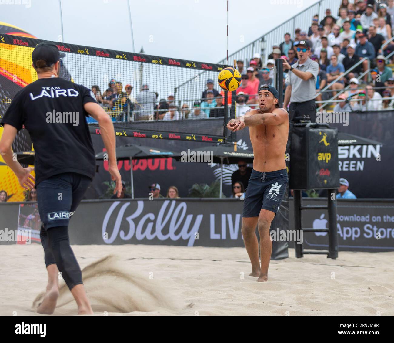 Trevor Crabb sets the ball during Round 3 of the AVP Huntington Beach ...