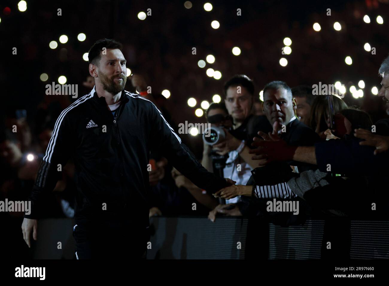 Argentina soccer player Lionel Messi greets fans during Maximiliano ...