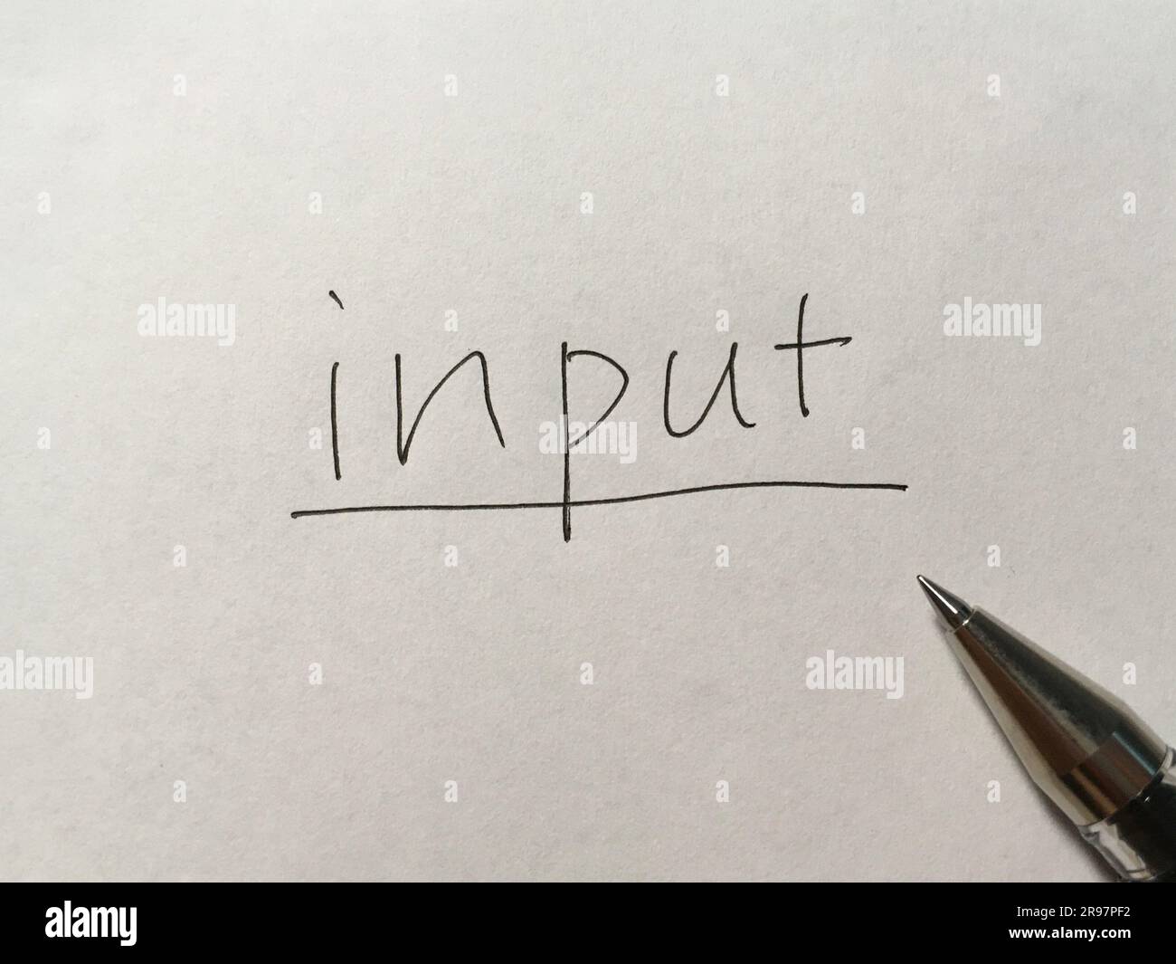 Input concept word on paper background Stock Photo - Alamy