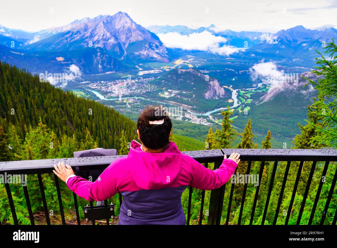 Banff, Canada, August 26th 2022 - A Tourist enjoys the panoramic view ...