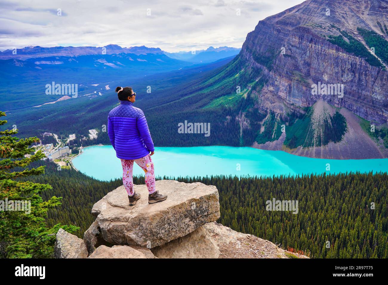 Banff, Canada, August 28th 2022 - A Tourist poses for a photo on the ...