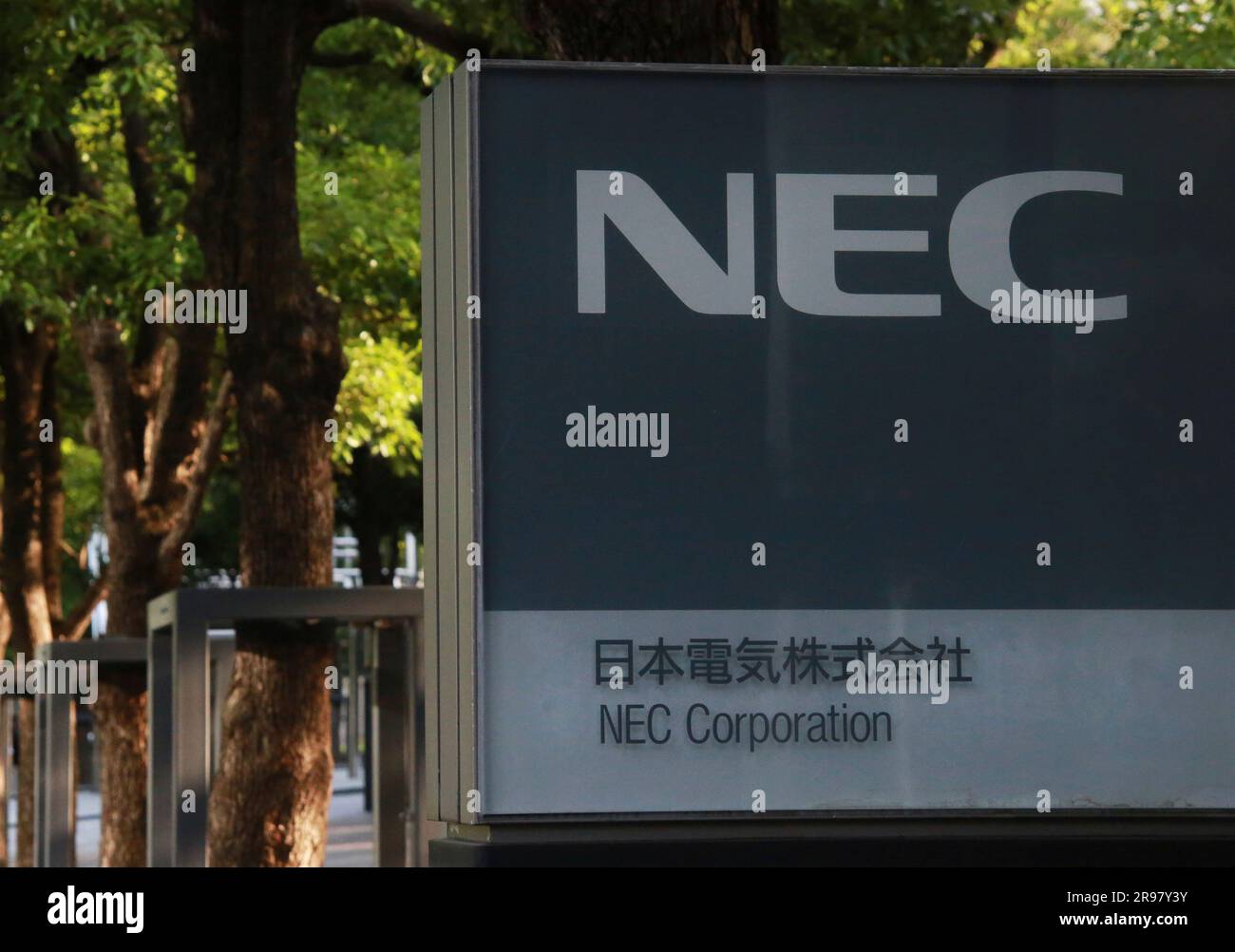 The logo of NEC Corporation is seen in Minato Ward, Tokyo on June 20, 2023. NEC Corporation is a ...